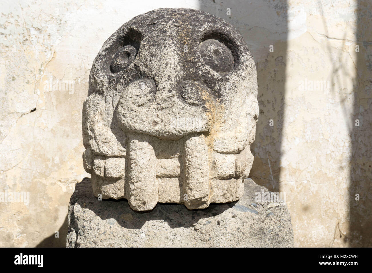 ancient historical stone head carving in the ruins of Chavin de Huantar ...