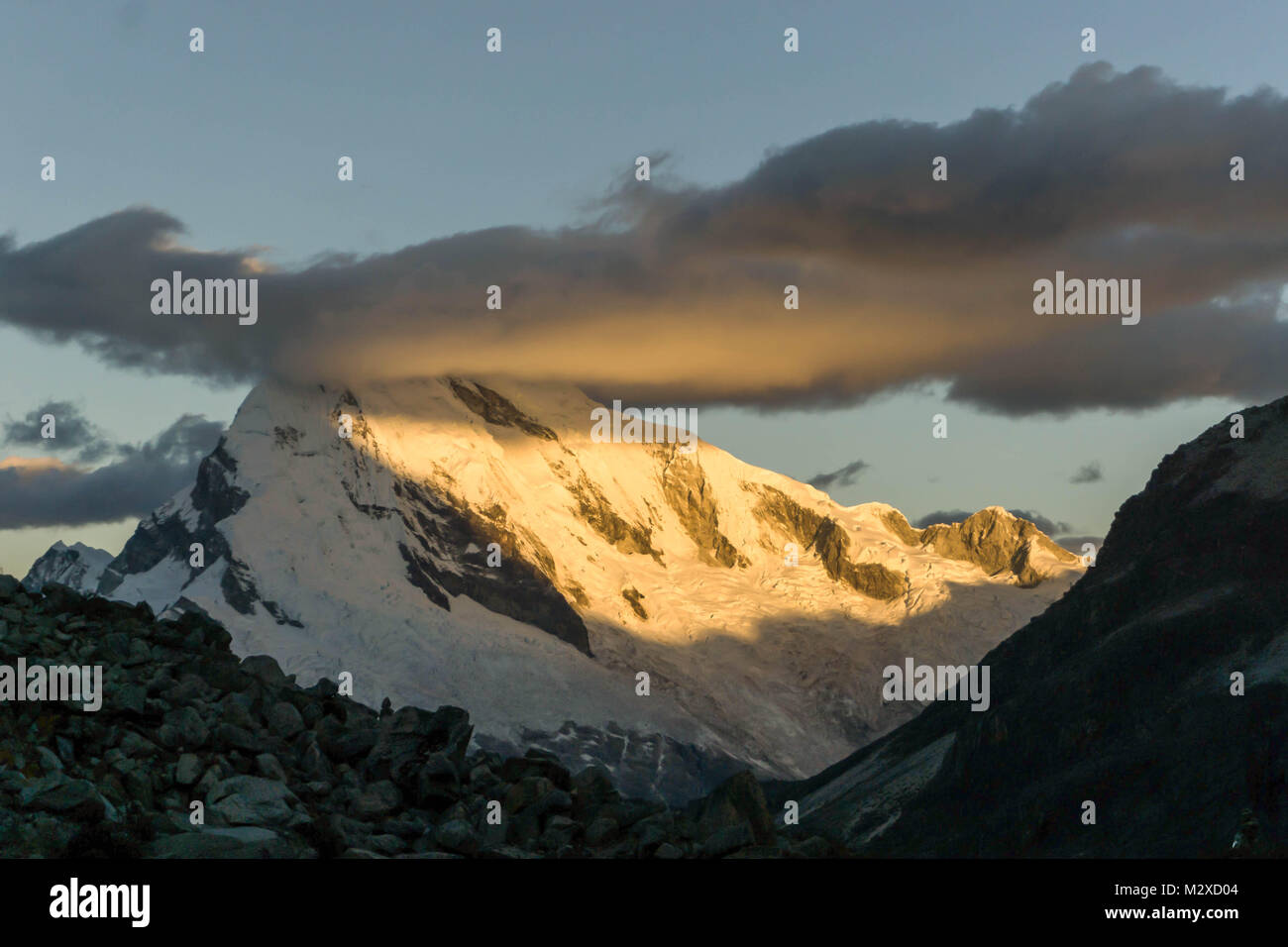 high snow-capped mountain peak landscape in the Cordillera Blanca in ...