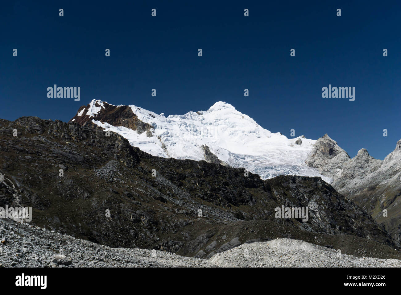 high snow-capped mountain peak landscape in the Cordillera Blanca in ...