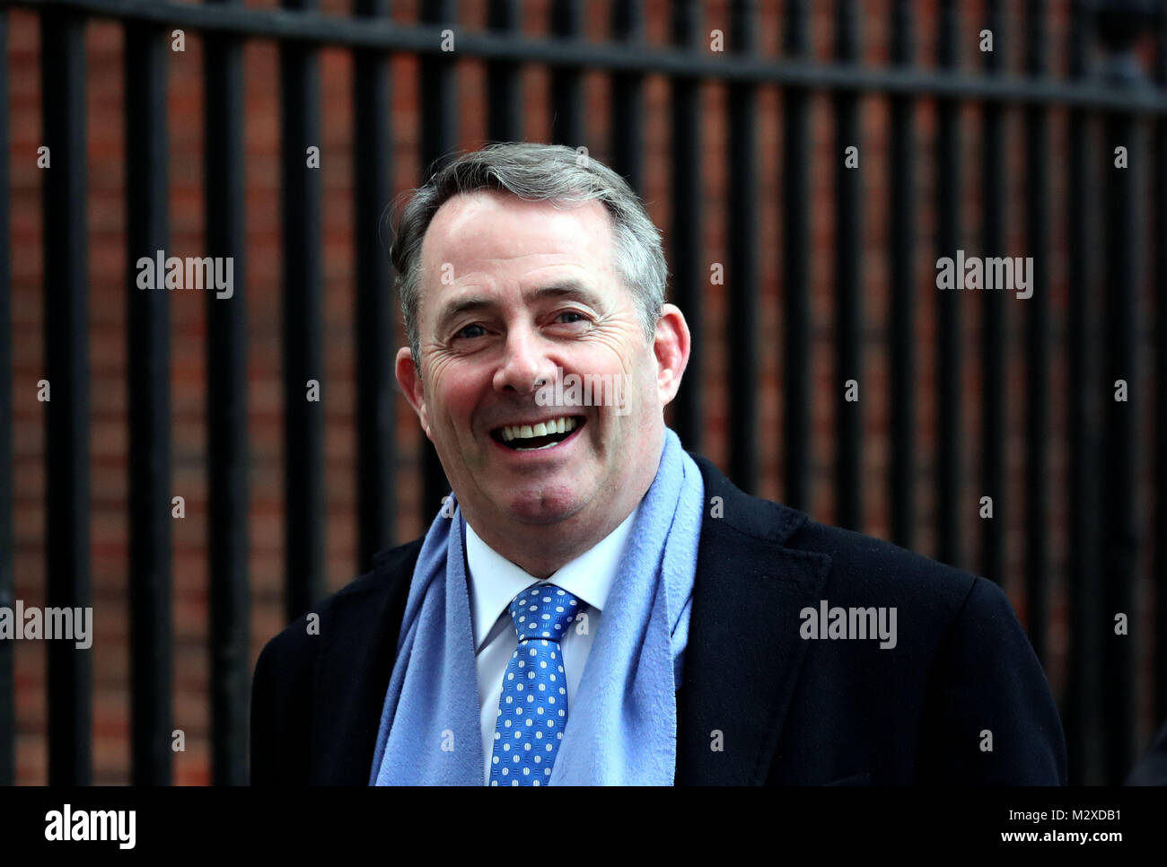 Liam Fox MP, Secretary of State for International Trade, smiles as he ...