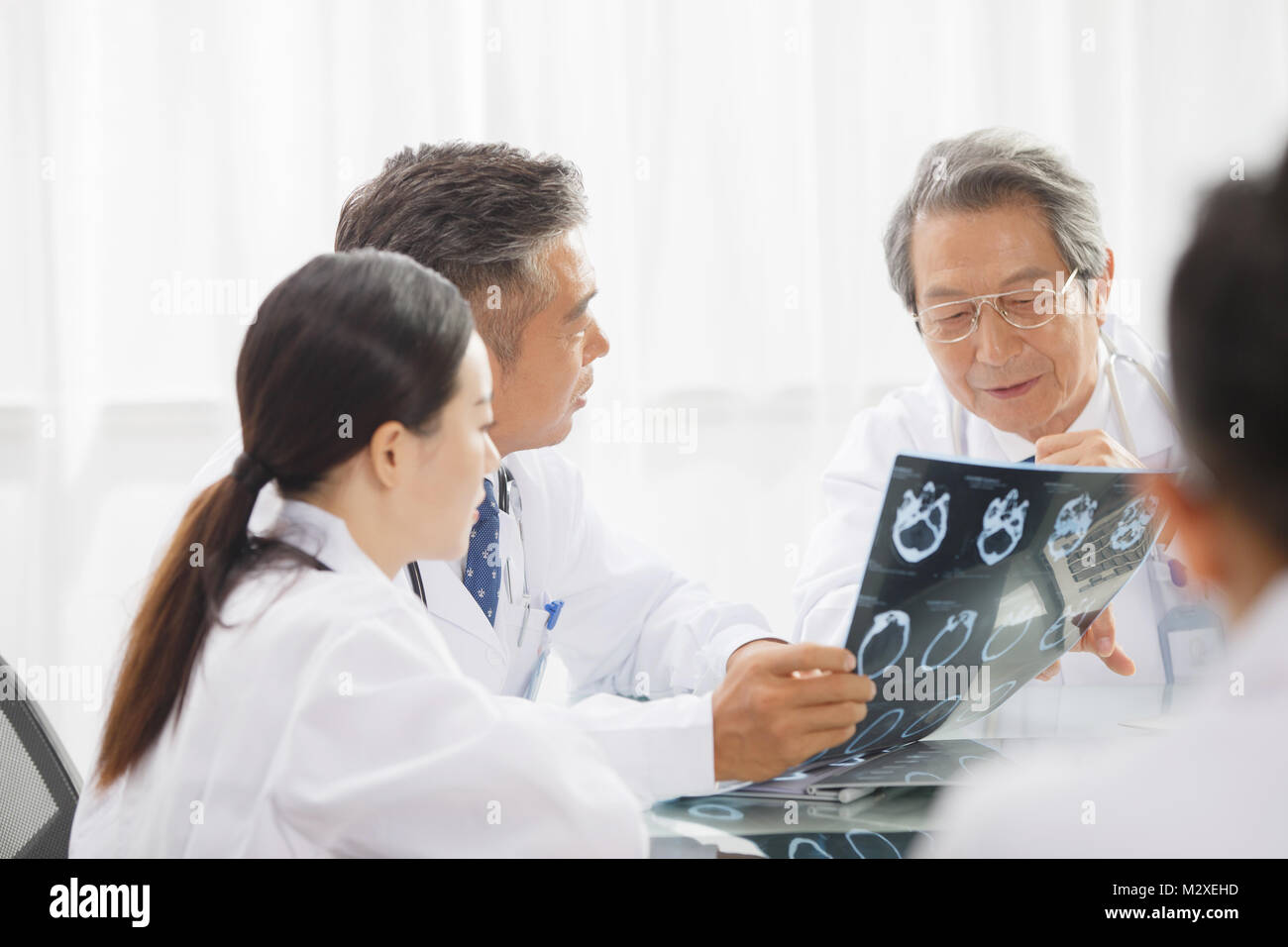 The doctor a meeting to discuss Stock Photo - Alamy