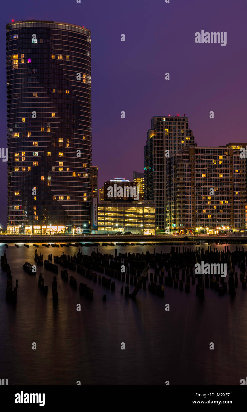 Jersey City, New Jersey skyline at twilight with skyscrapers ...