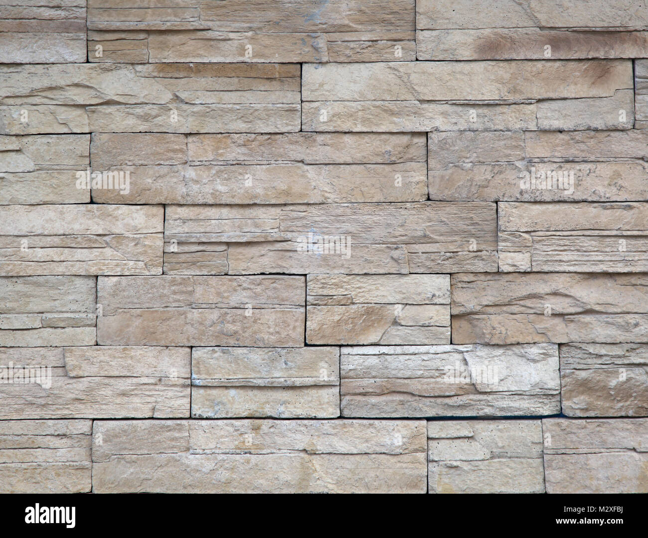 Detailed beige natural stone building material texture Stock Photo - Alamy