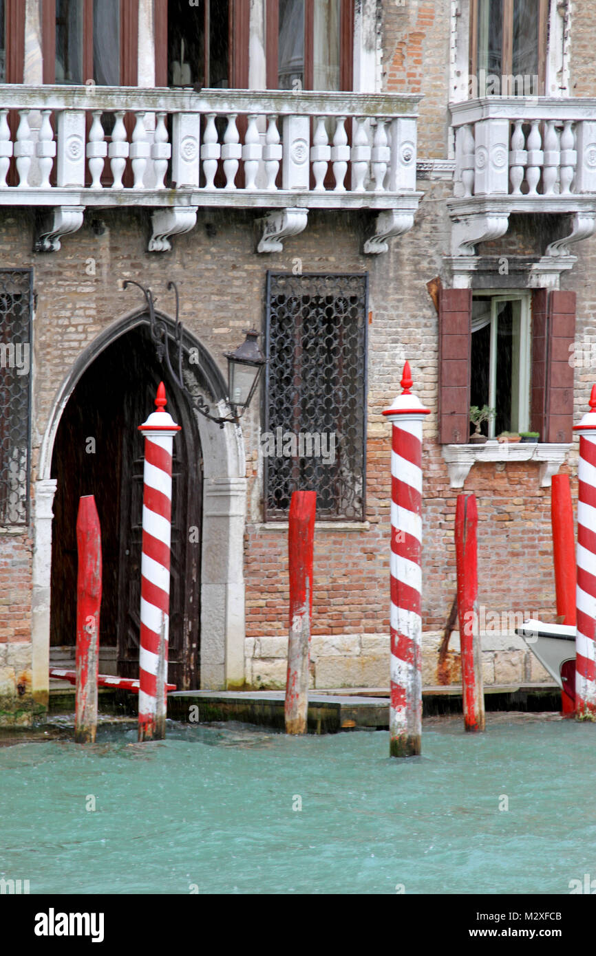 Entrance to Venice house on canal during rainy day Stock Photo - Alamy