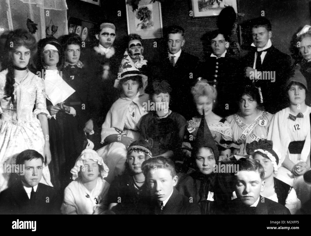 Group portrait of costumed party goers in Germany, ca. 1935 Stock Photo ...