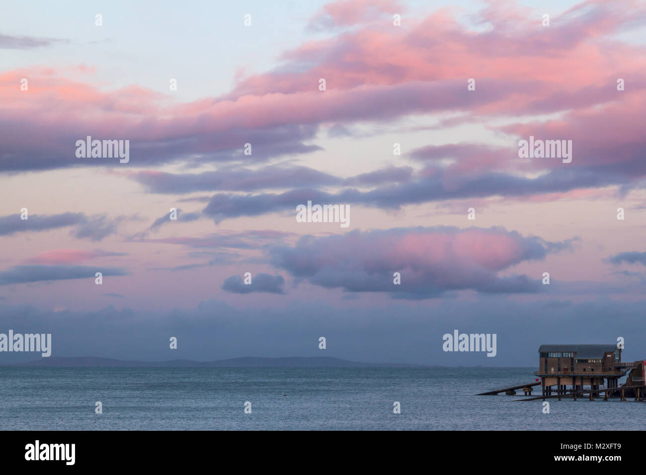 Tenby lifeboat house at sunset Stock Photo - Alamy