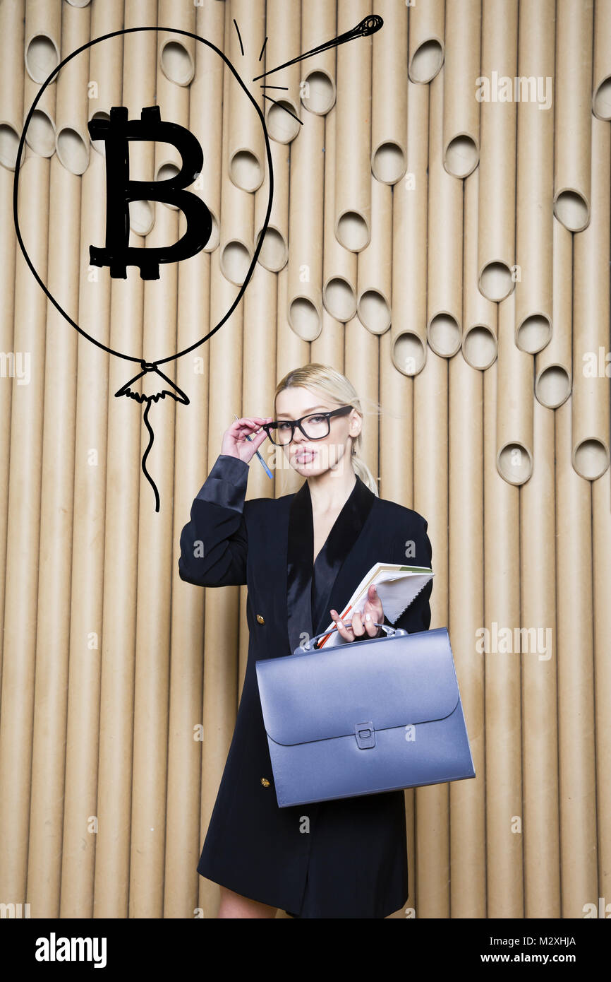 Beautiful blond woman showing standing near bitcoin sketch. Virtual ...