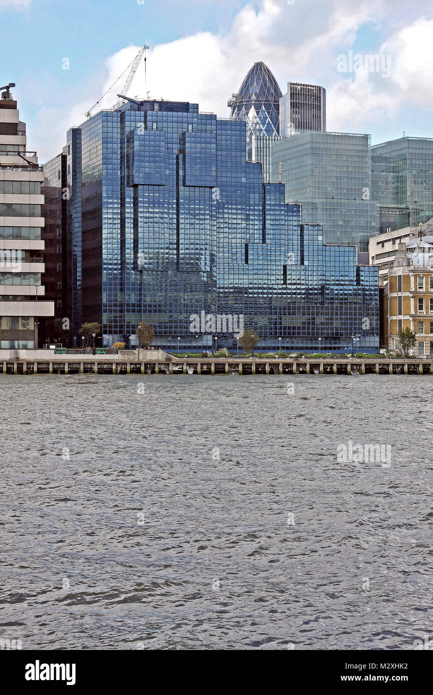 Modern glass building on Thames river coast in London Stock Photo - Alamy