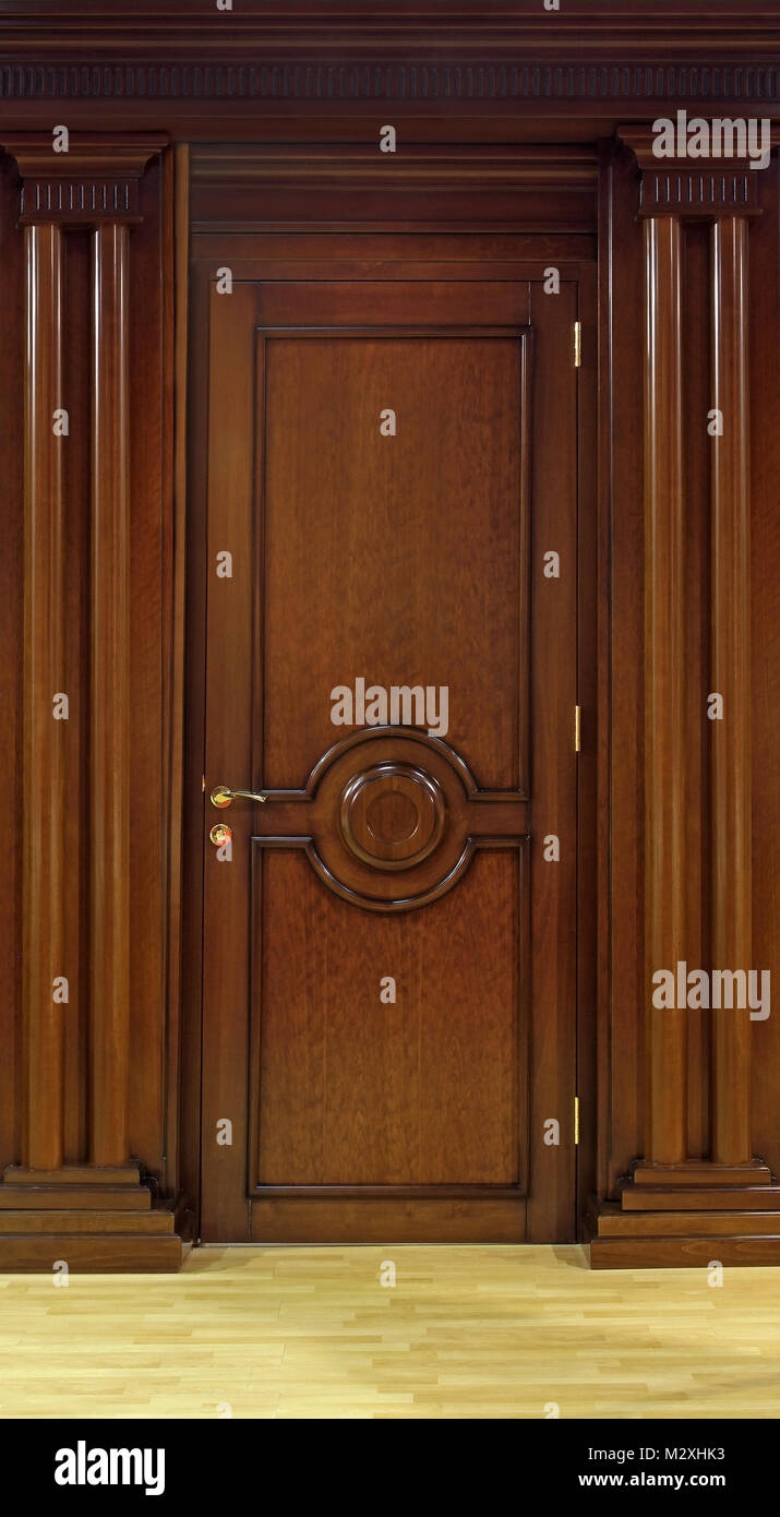 Old large dark brown wooden entrance door Stock Photo - Alamy