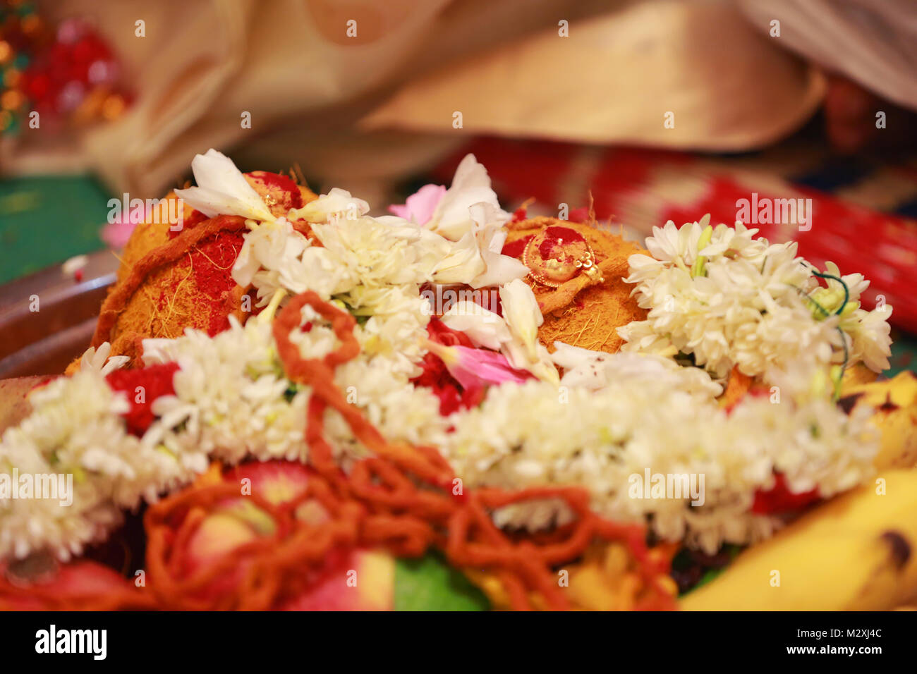 Closeup shot flowers with jewelry, Hindu Indian wedding ceremony Stock ...