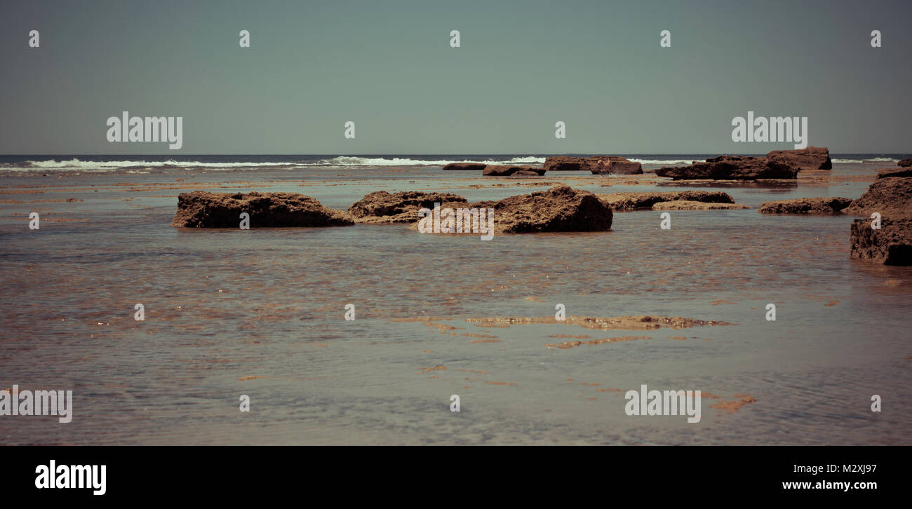 Rocks on the beach Stock Photo - Alamy