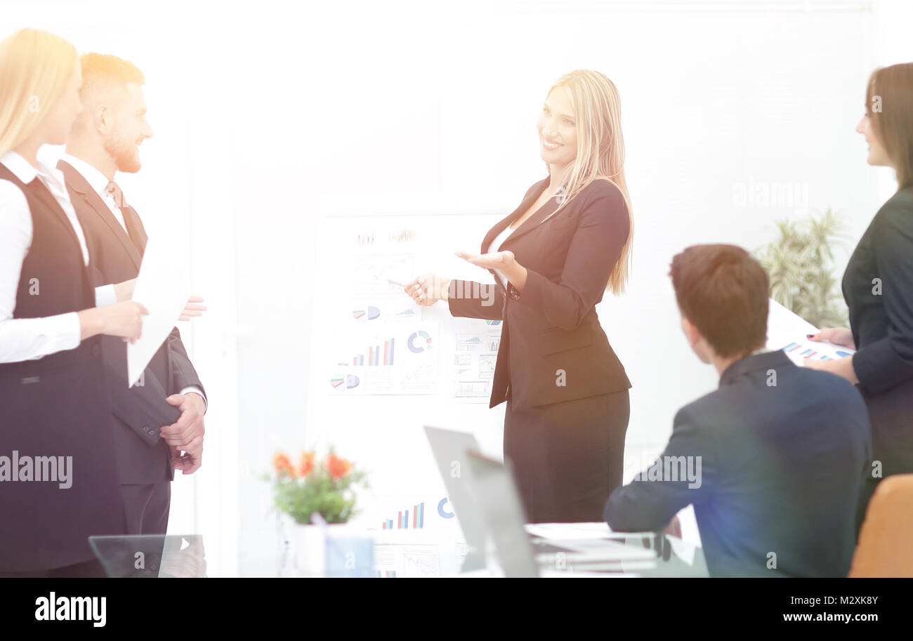business woman doing a presentation to his business team Stock Photo ...