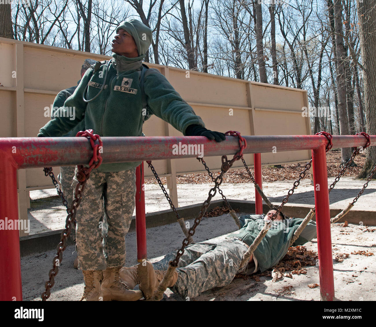 Staff Sgt. Anthony Clay waits for the next team member to come down the ...