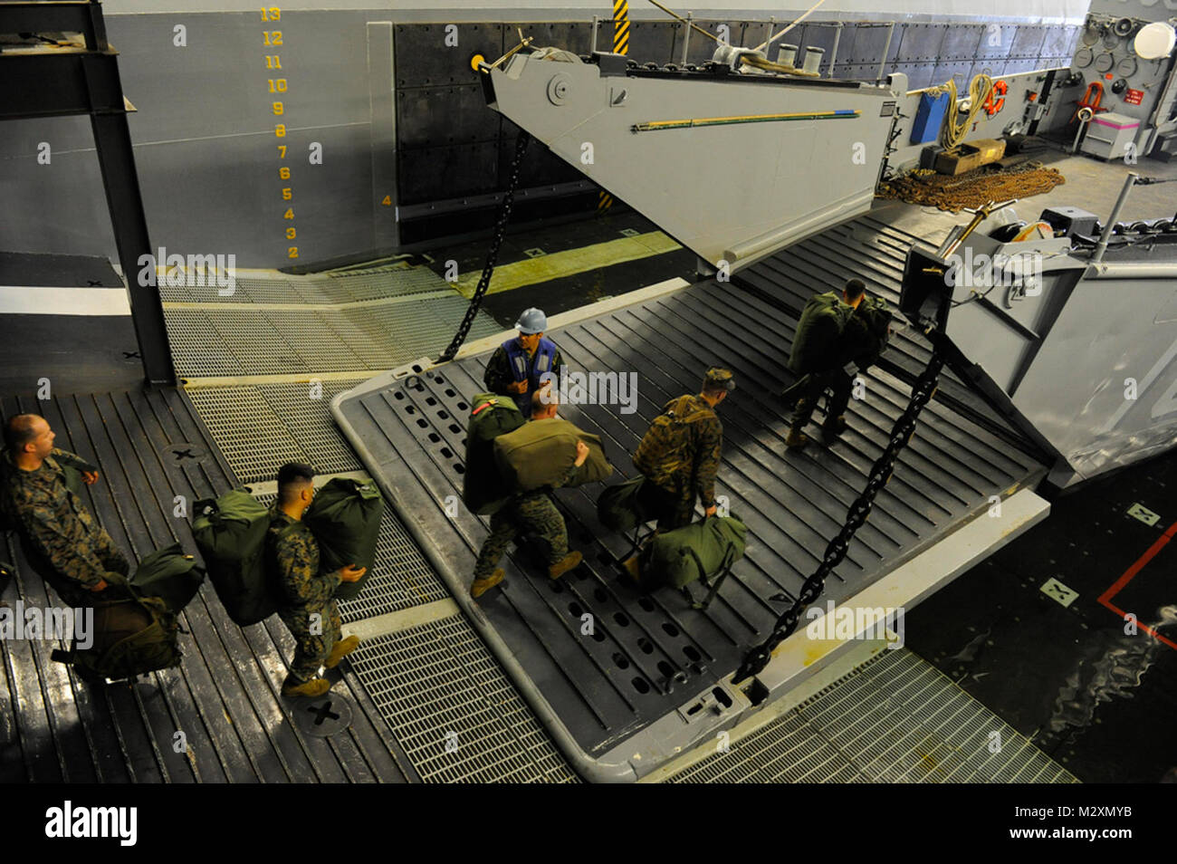 Marines board a landing craft unit onboard USS Bonhomme Richard during ...