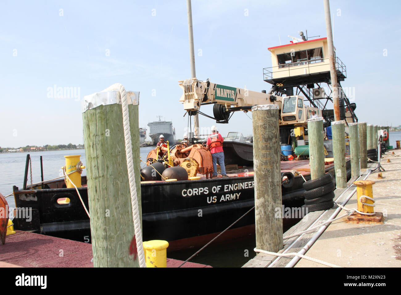 Crew members of the U.S. Army Corps of Engineers vessel Elizabeth ...
