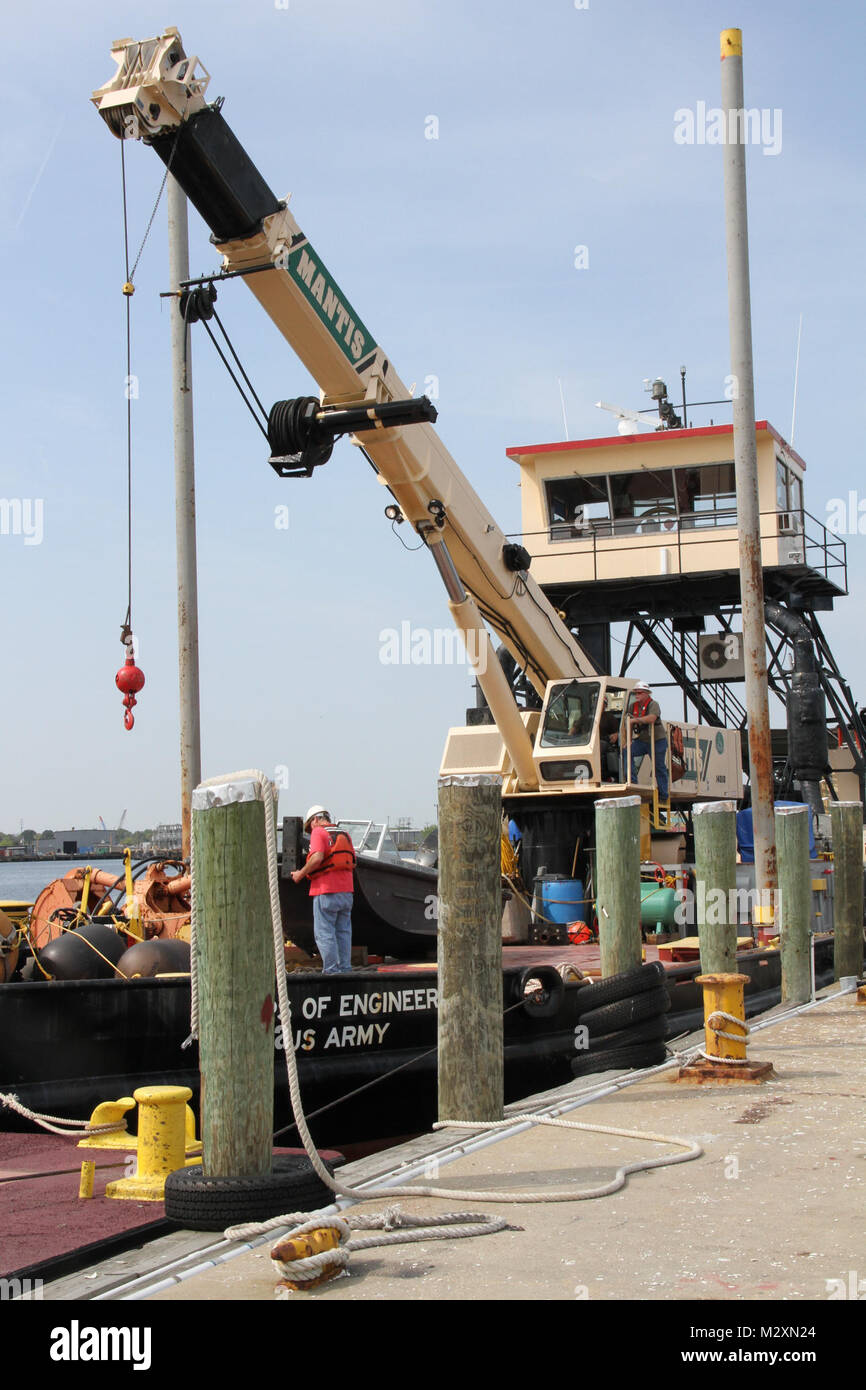 Crew members of the U.S. Army Corps of Engineers vessel Elizabeth ...