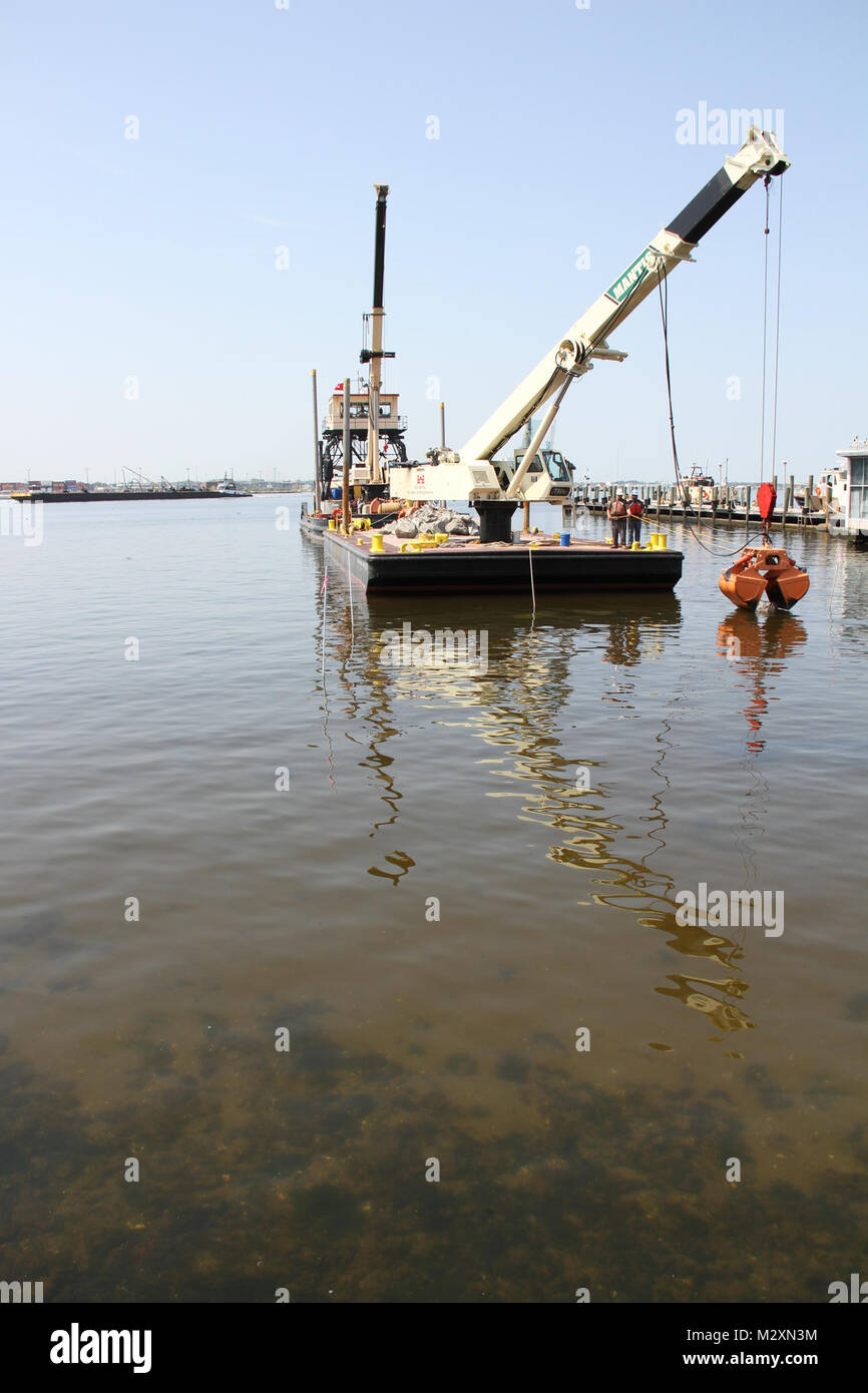 The Elizabeth, a U.S. Army Corps of Engineers vessel, and the barge it ...