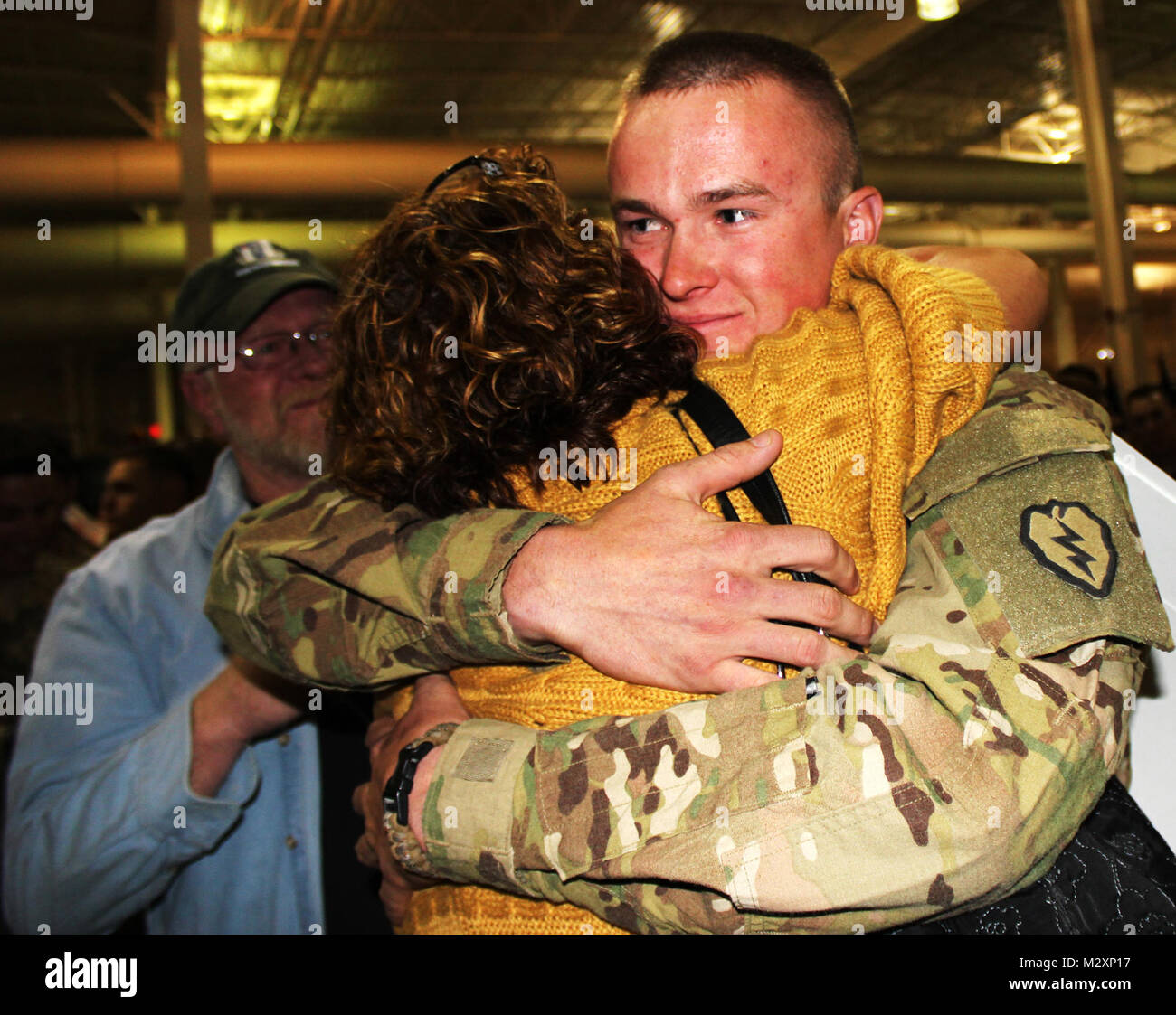 Pfc. Matthew Hoskinson and his mom Meg Hoskinson, share a tender ...