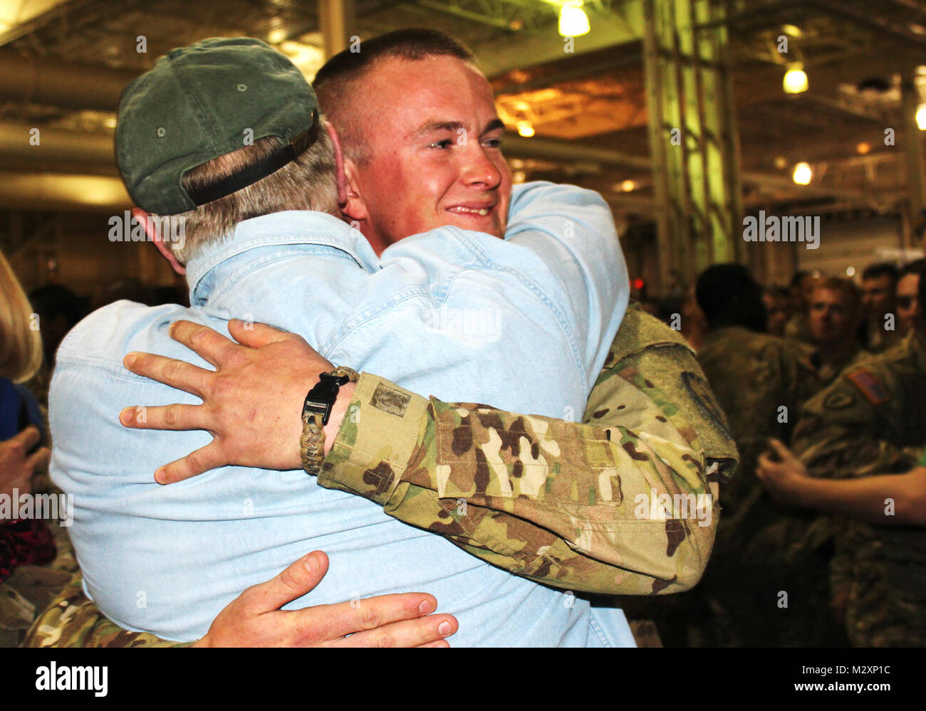 Pfc. Matthew Hoskinson and his father Robert "Hoss" Hoskinson, share a ...