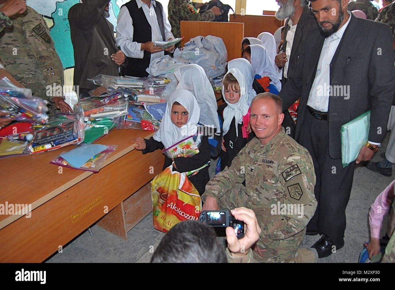 648th MEB commander poses with Afghan students by Georgia National ...