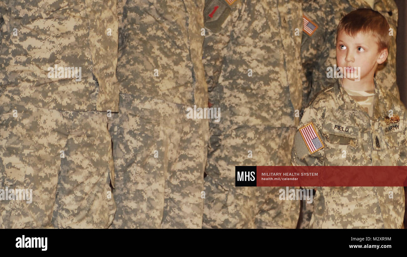 Command Sgt. Maj. Ian Field, 7, stands with his squad during a farewell ...
