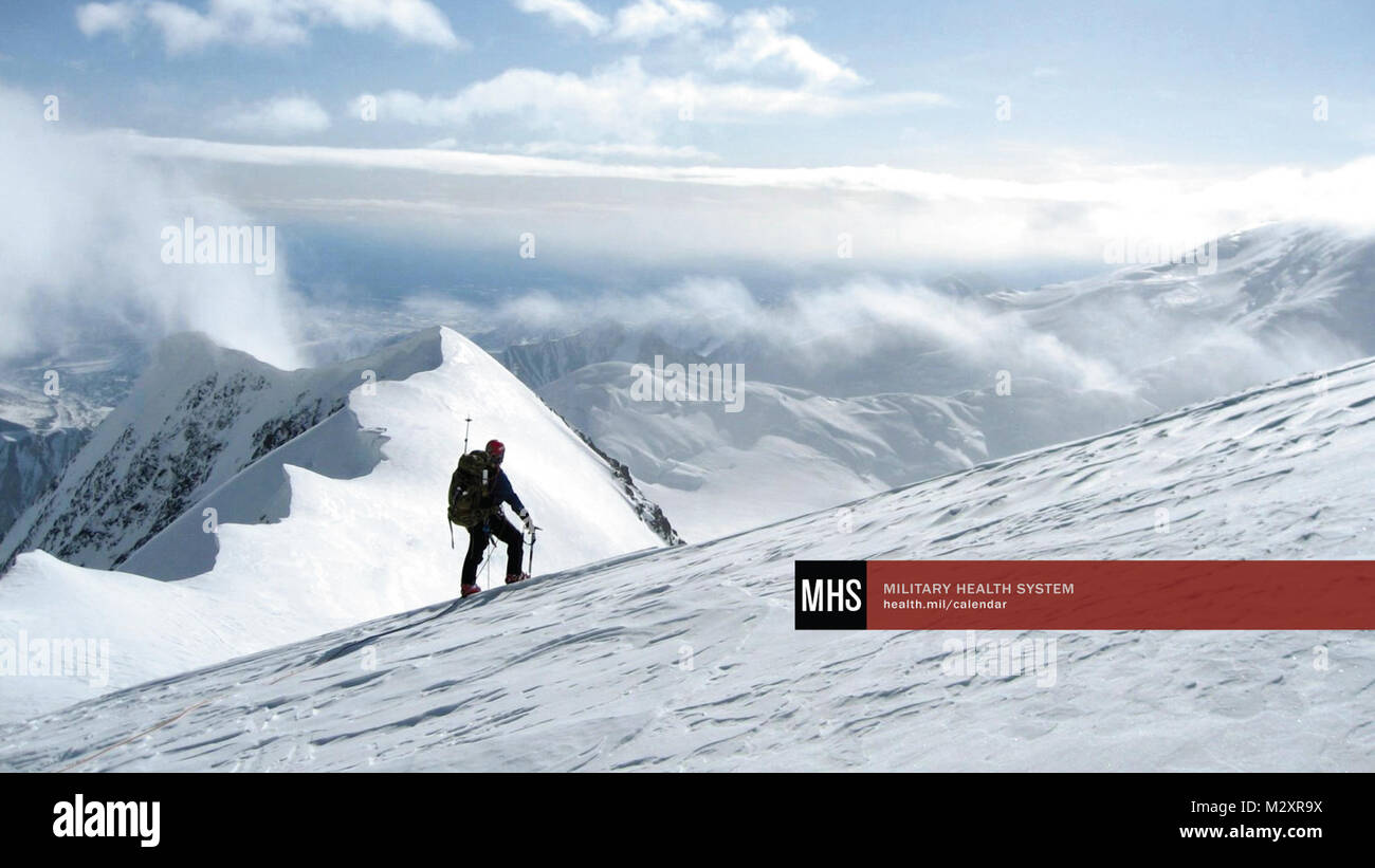 Capt. Keelan McNulty surveys the majesty of the Alaskan mountain range ...