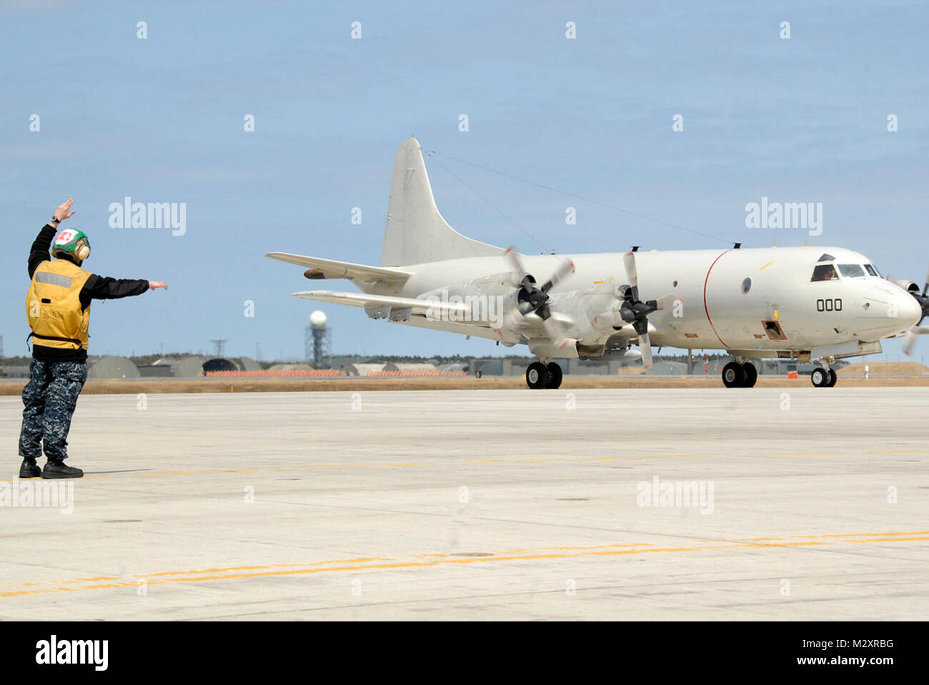 P-3 aircraft as it taxis across the Naval Air Facility Misawa ramp by # ...
