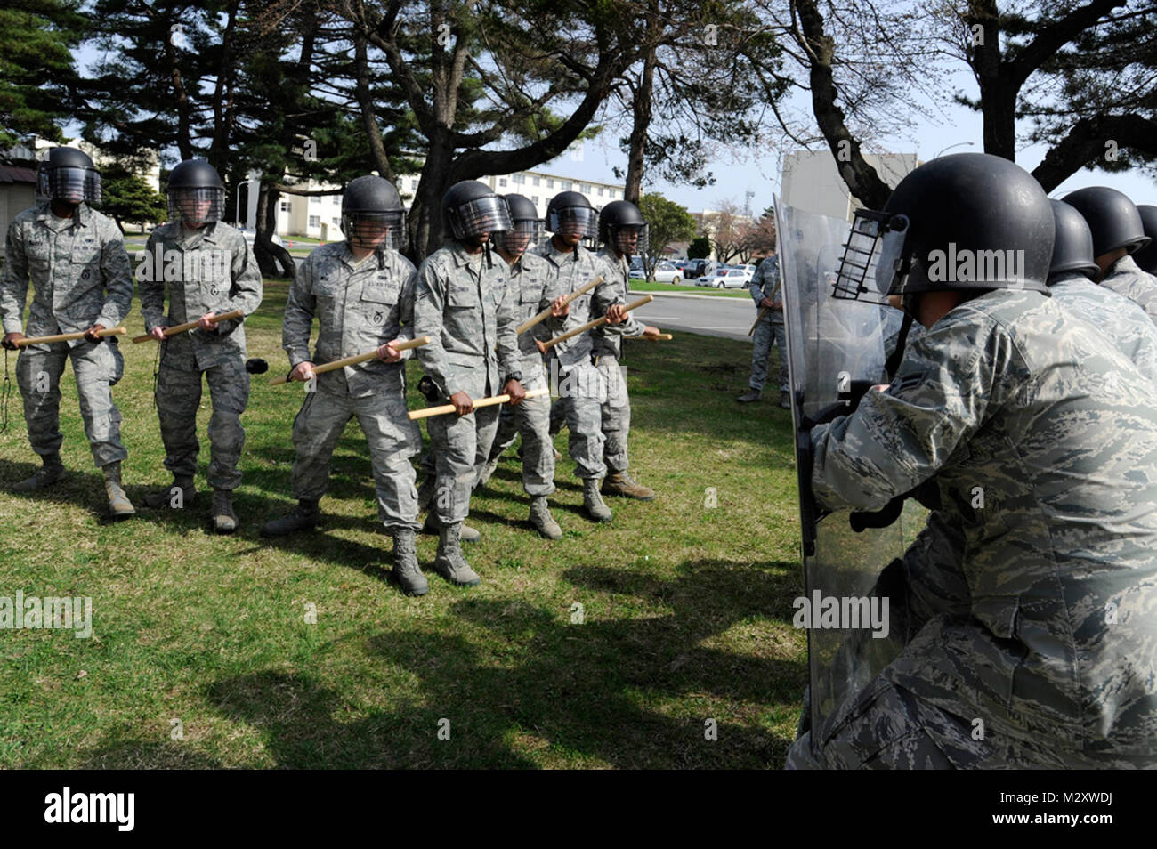 U.S. Airmen with the 35th Security Forces Squadron make a wedge ...