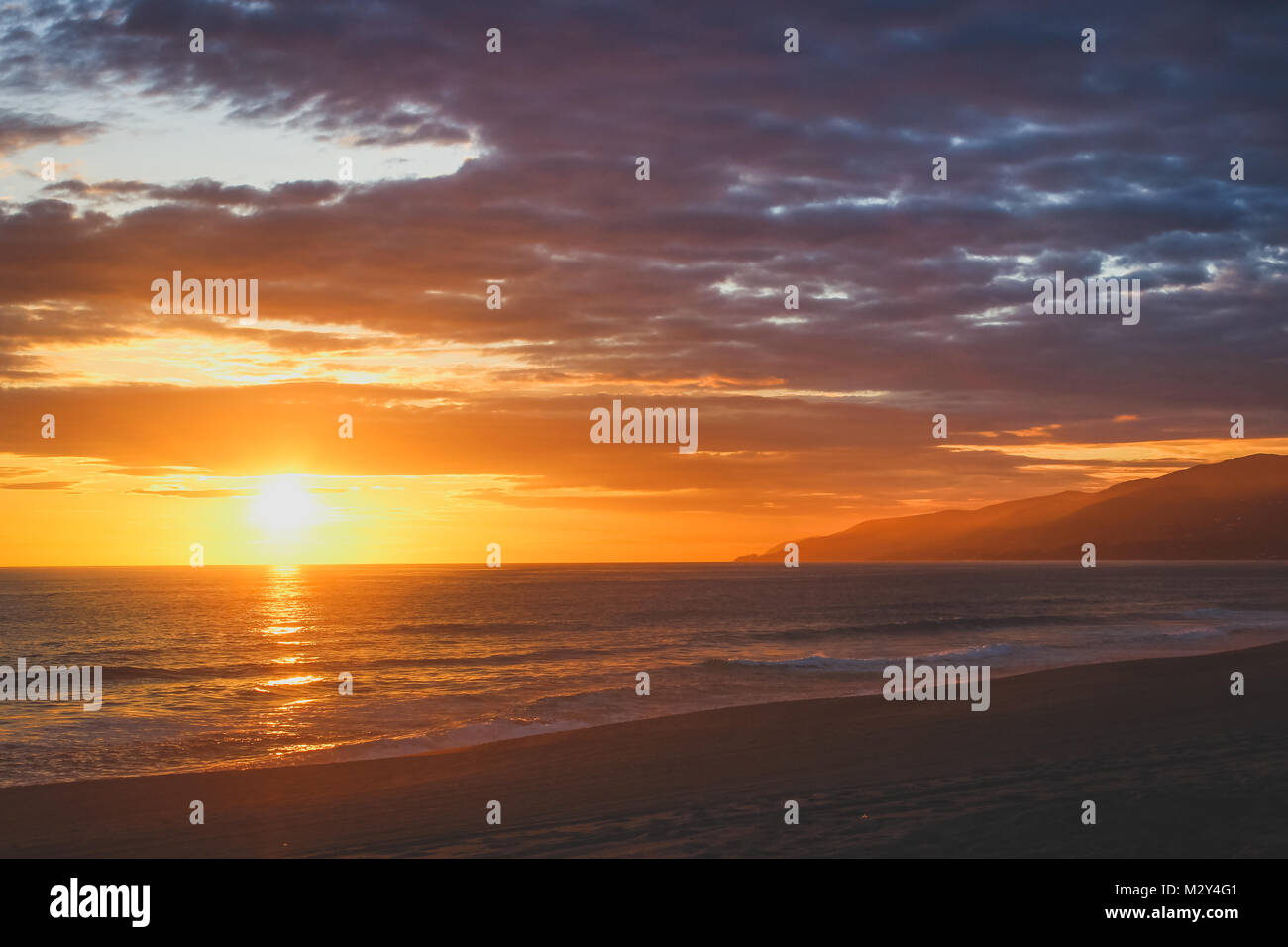 Beautiful coastal sunset on an empty Point Dume State Beach with ...