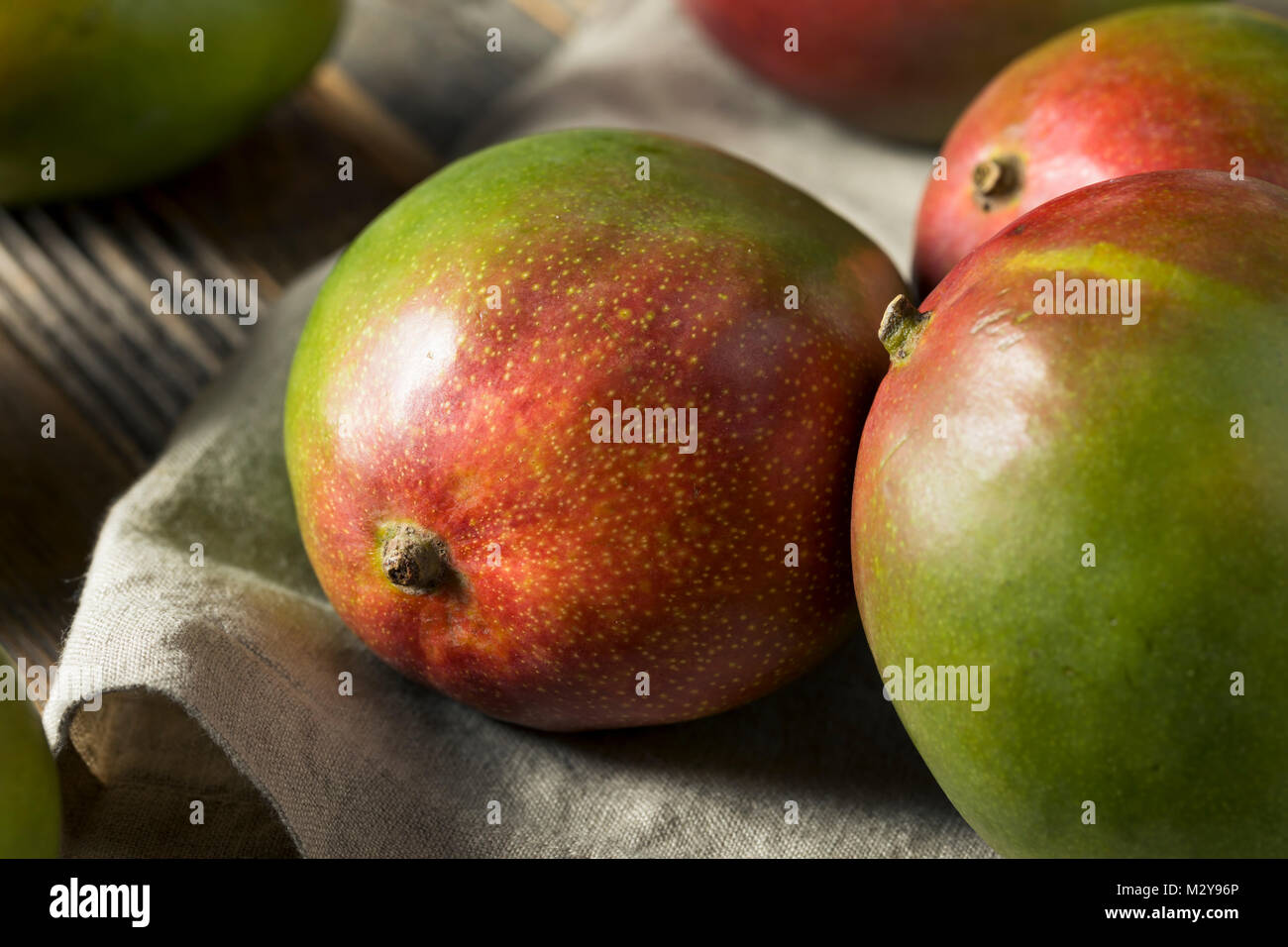 Raw Red Green Organic Mango Fruit Ready to Eat Stock Photo - Alamy