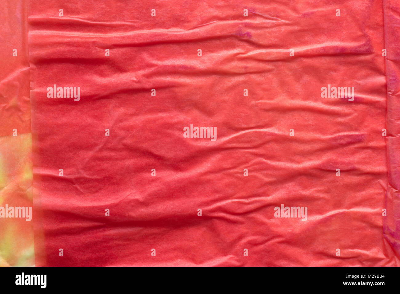 red color creased tissue paper bacground texture Stock Photo - Alamy