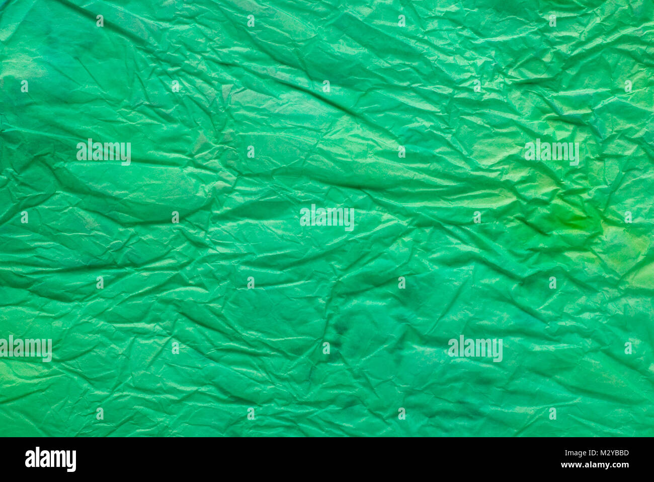 green color creased tissue paper bacground texture Stock Photo - Alamy