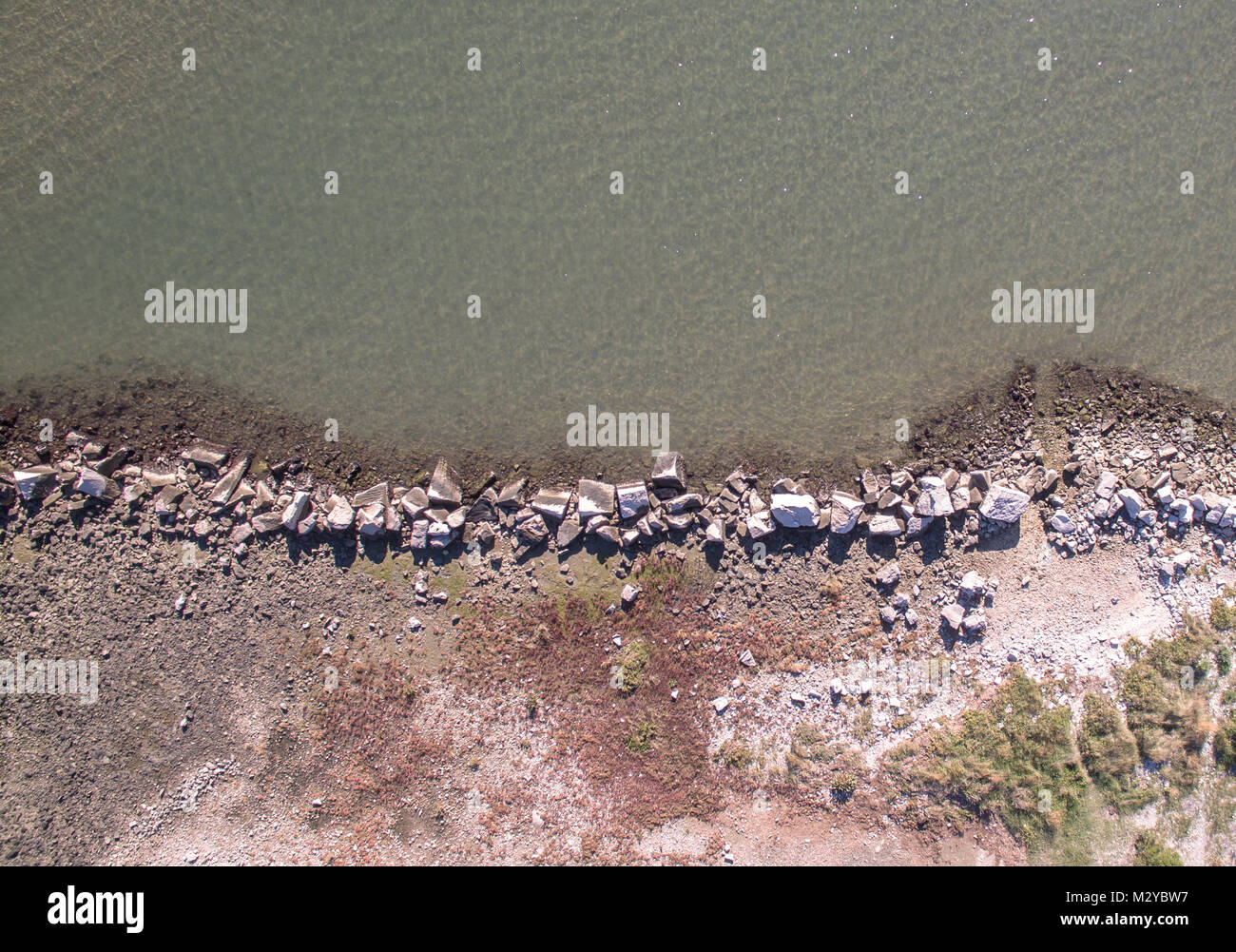 Top aerial view pollution and dirt from the sea water, seen from above ...