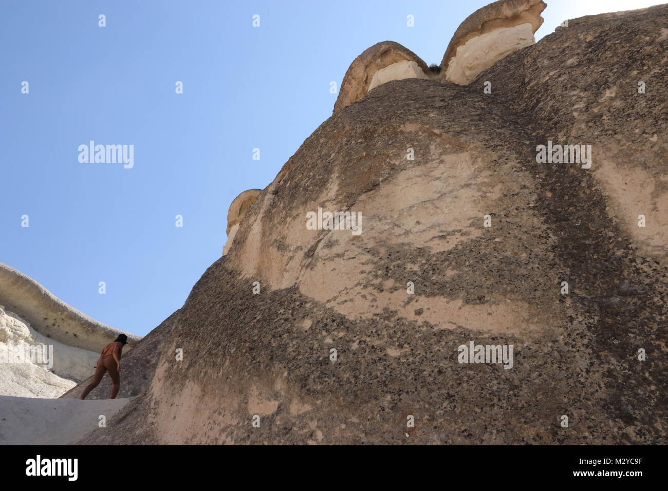 Tourists visiting some of the famous Fairy chimneys in Cappadocia which ...