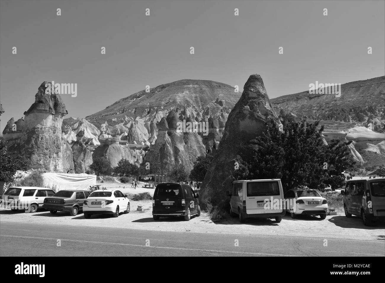 Tourists visiting some of the famous Fairy chimneys in Cappadocia which ...