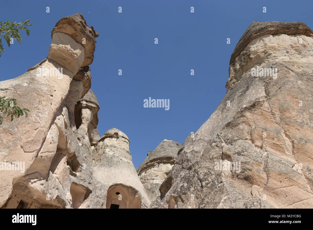 Tourists visiting some of the famous Fairy chimneys in Cappadocia which ...
