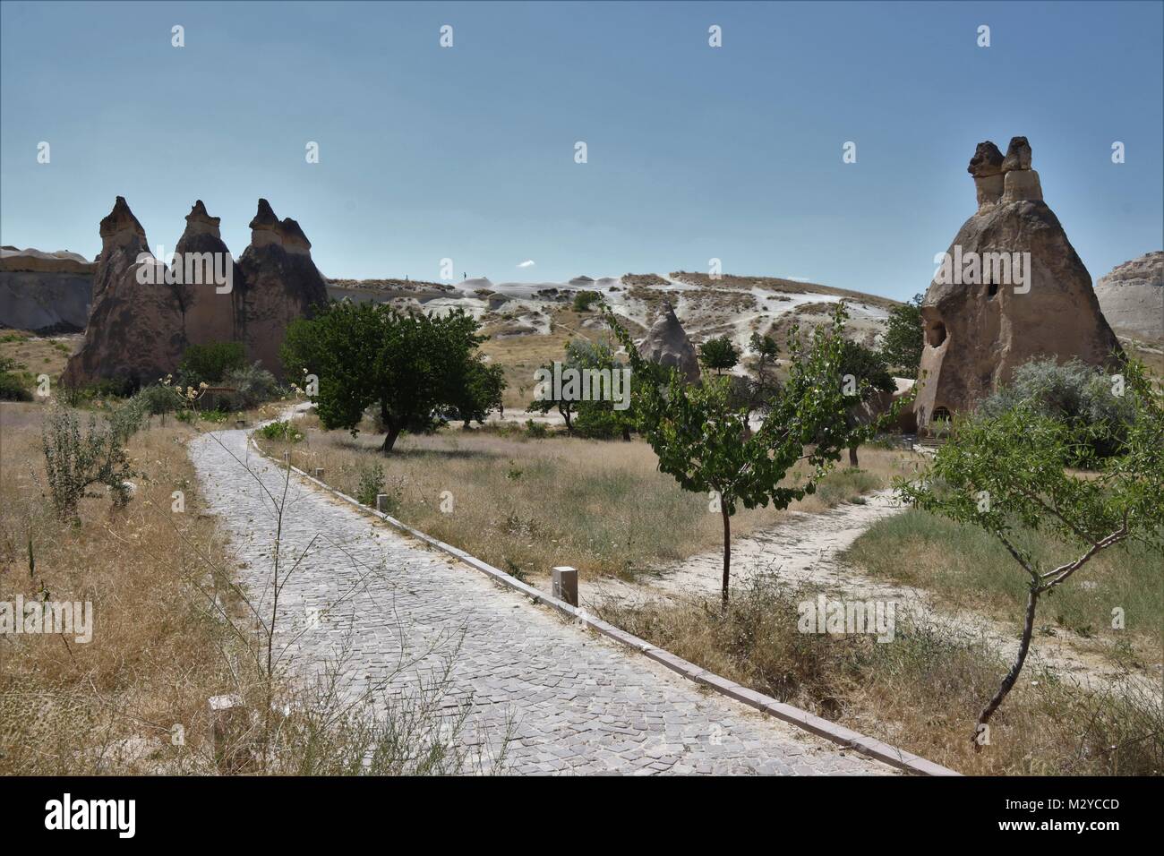 Tourists visiting some of the famous Fairy chimneys in Cappadocia which ...