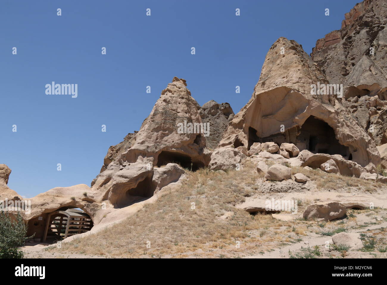Tourists visiting some of the famous Fairy chimneys in Cappadocia which ...