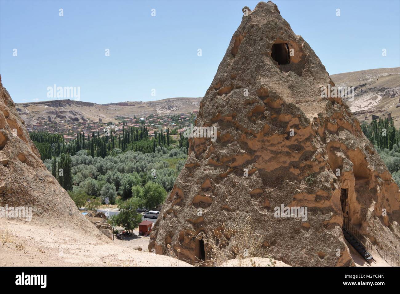 Tourists visiting some of the famous Fairy chimneys in Cappadocia which ...