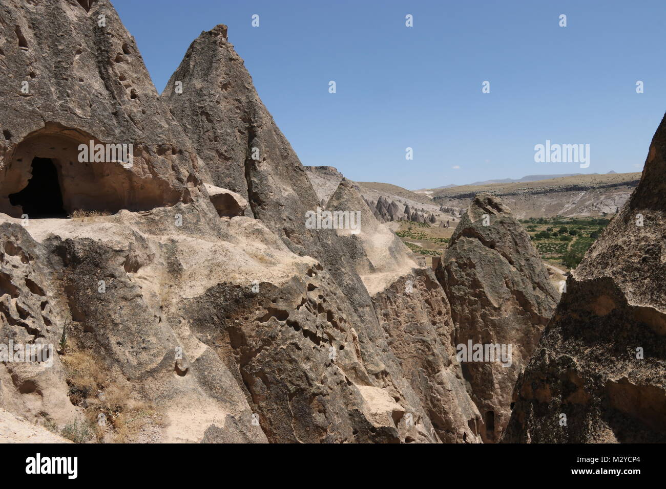 Tourists visiting some of the famous Fairy chimneys in Cappadocia which ...