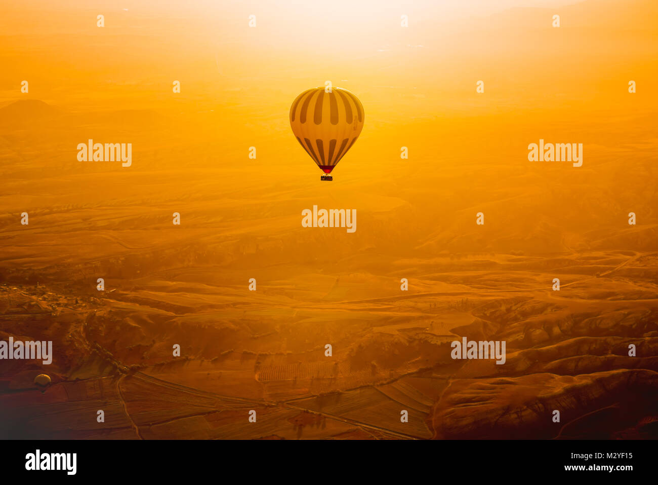Hot air balloon flying over Cappadocia region, Turkey Stock Photo - Alamy
