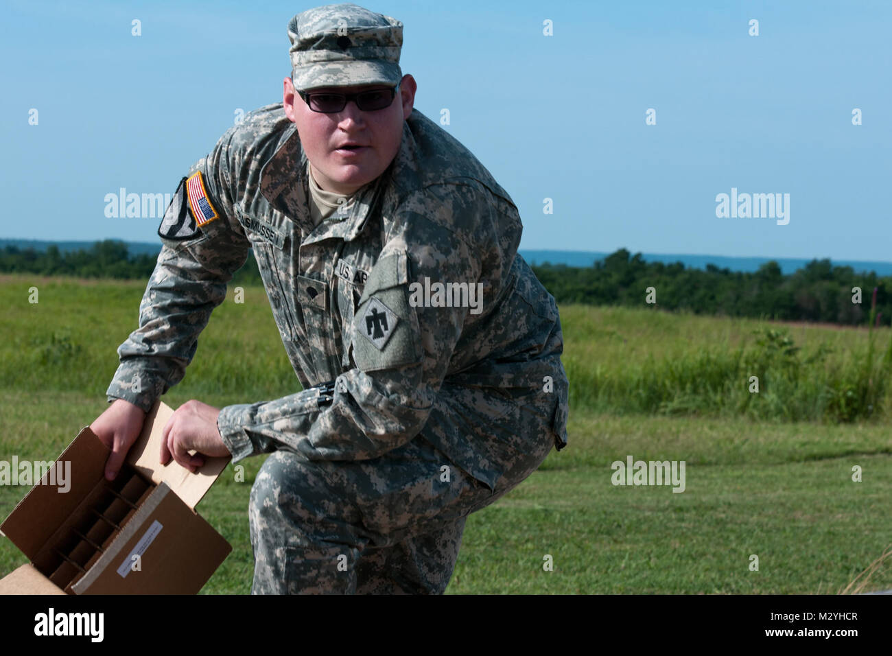 Spc. Brice Rasmussen, a chaplains assistant with Headquarters and ...