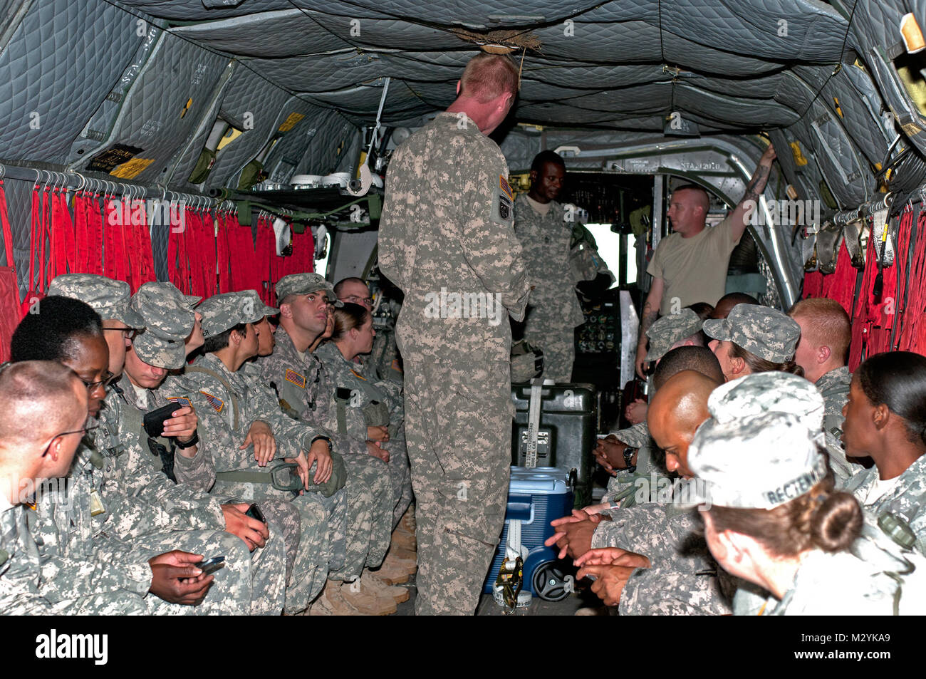 Soldiers with the 316th Sustainment Command (Expeditionary) being given ...