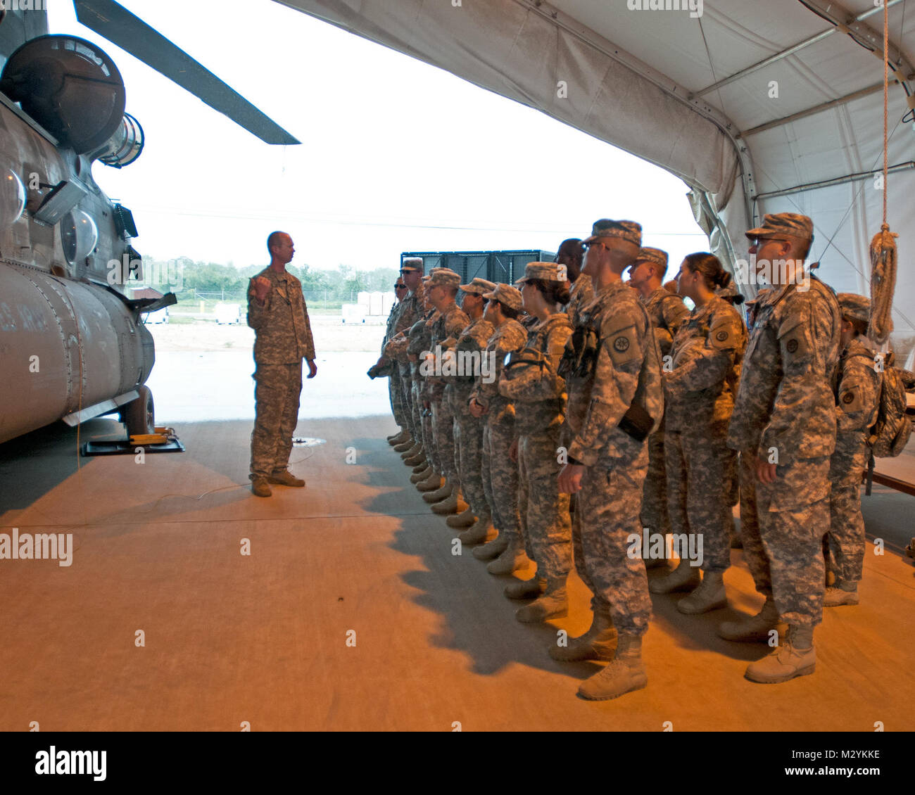 Soldiers with the 316th Sustainment Command (Expeditionary) being given ...