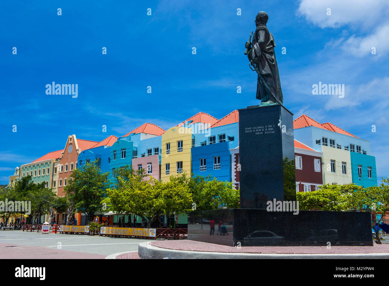 The colourful dutch houses at the Sint Annabaai in Wilemstad City ...