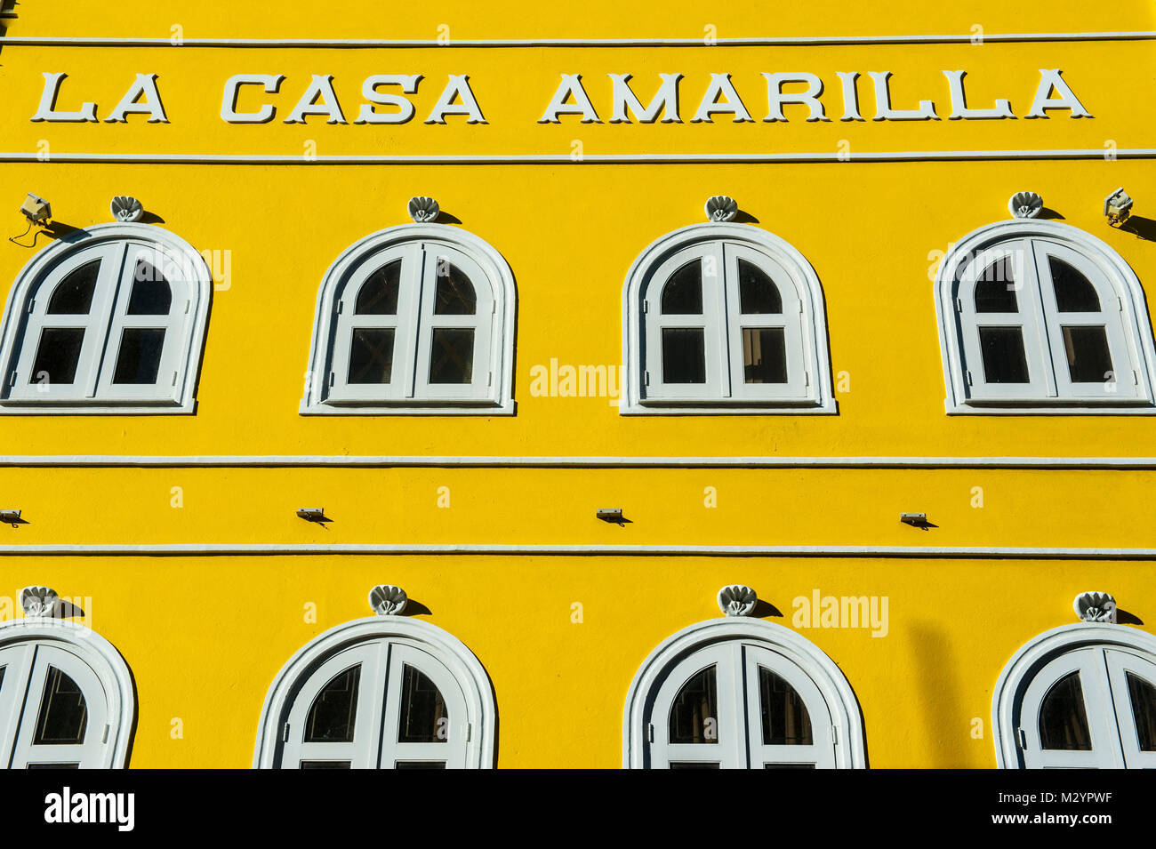 The colourful dutch houses at the Sint Annabaai in Wilemstad City ...
