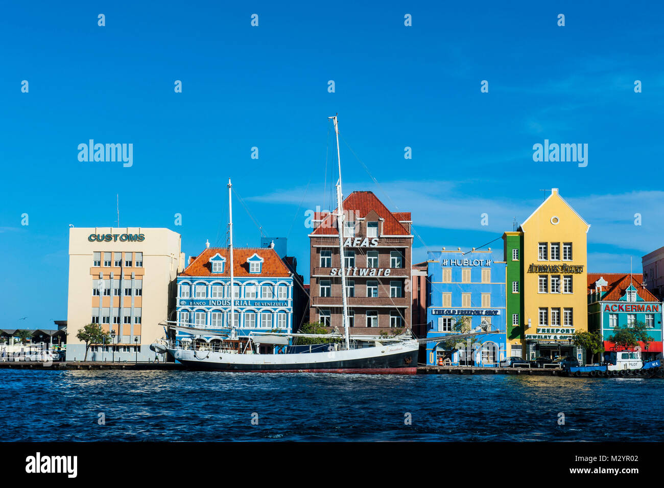 The dutch houses at the Sint Annabaai in Wilemstad City, capital of ...