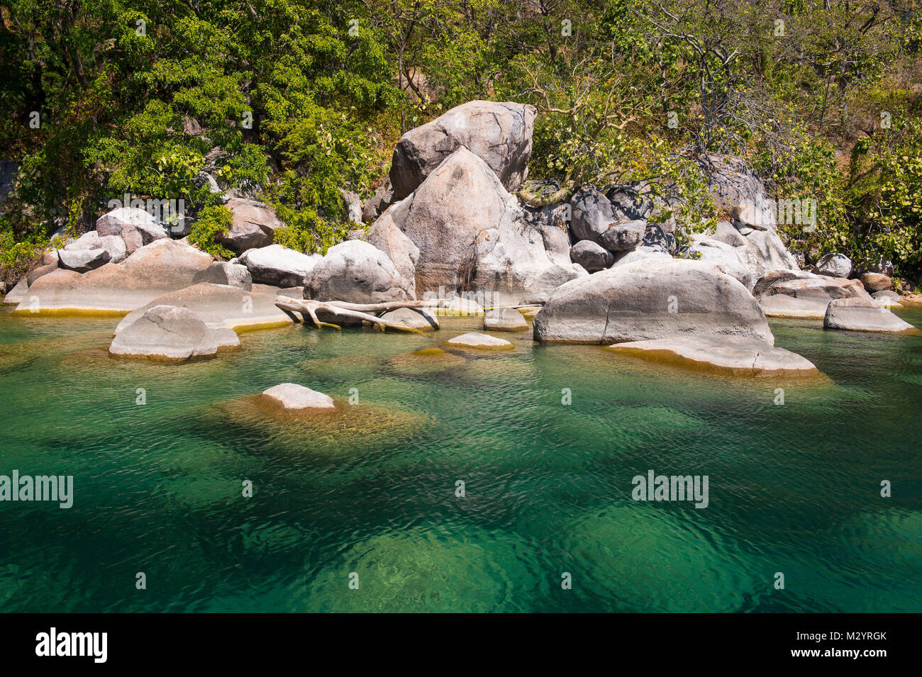 Turquoise clear water and granite rocks, Mumbo island, Cape Maclear ...