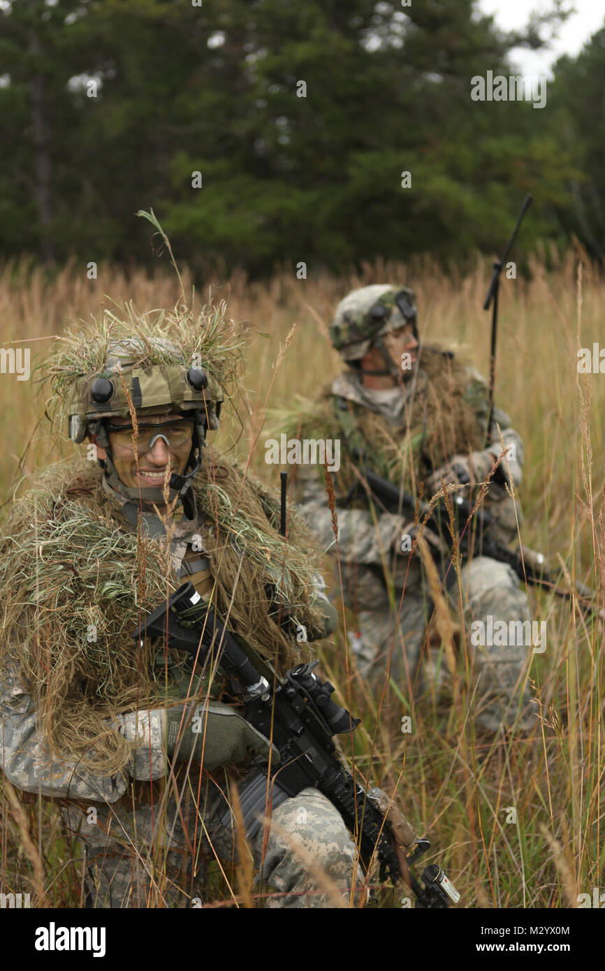 Guardsmen celebrate successful assault during reconnaissance training ...