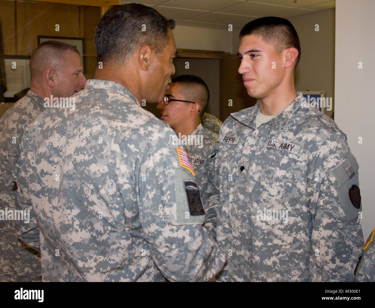 Maj. Gen. Michael Garrett, commander of U.S. Army Alaska, presents a ...
